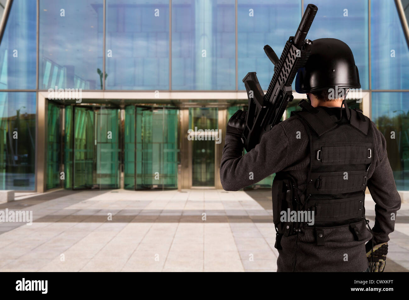 Military defending a business building Stock Photo - Alamy