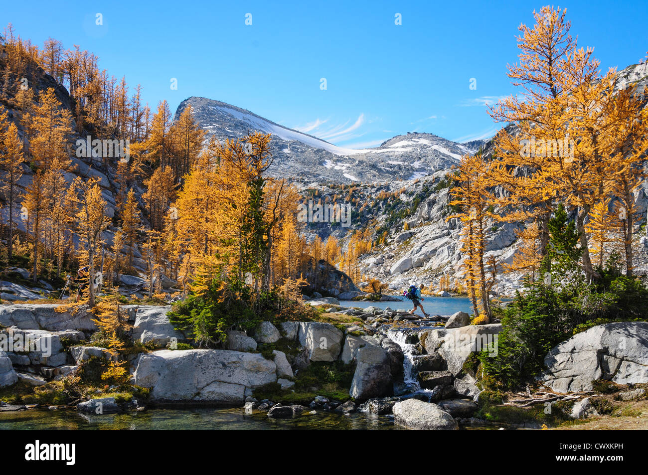 Backpacker at Perfection Lake with Little Annapurna mountain in ...