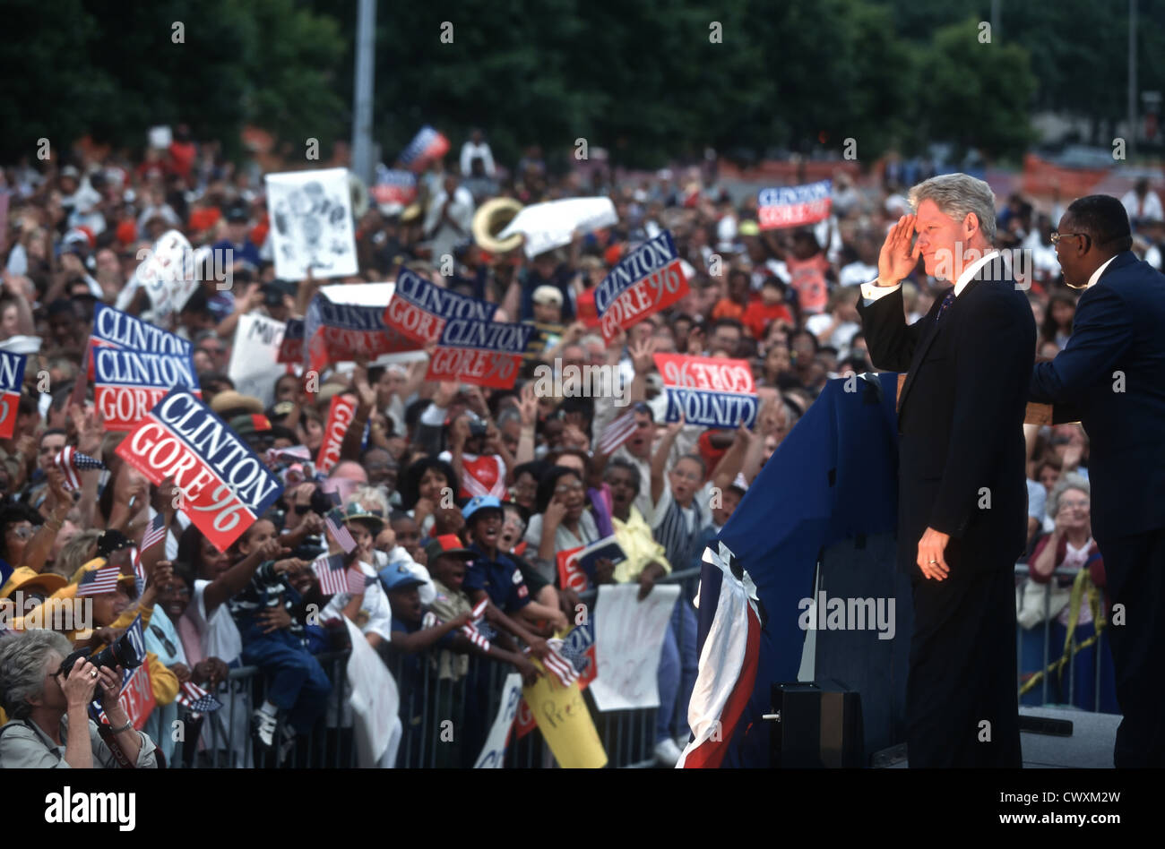 President Bill Clinton salutes supporters during a campaign stop for ...
