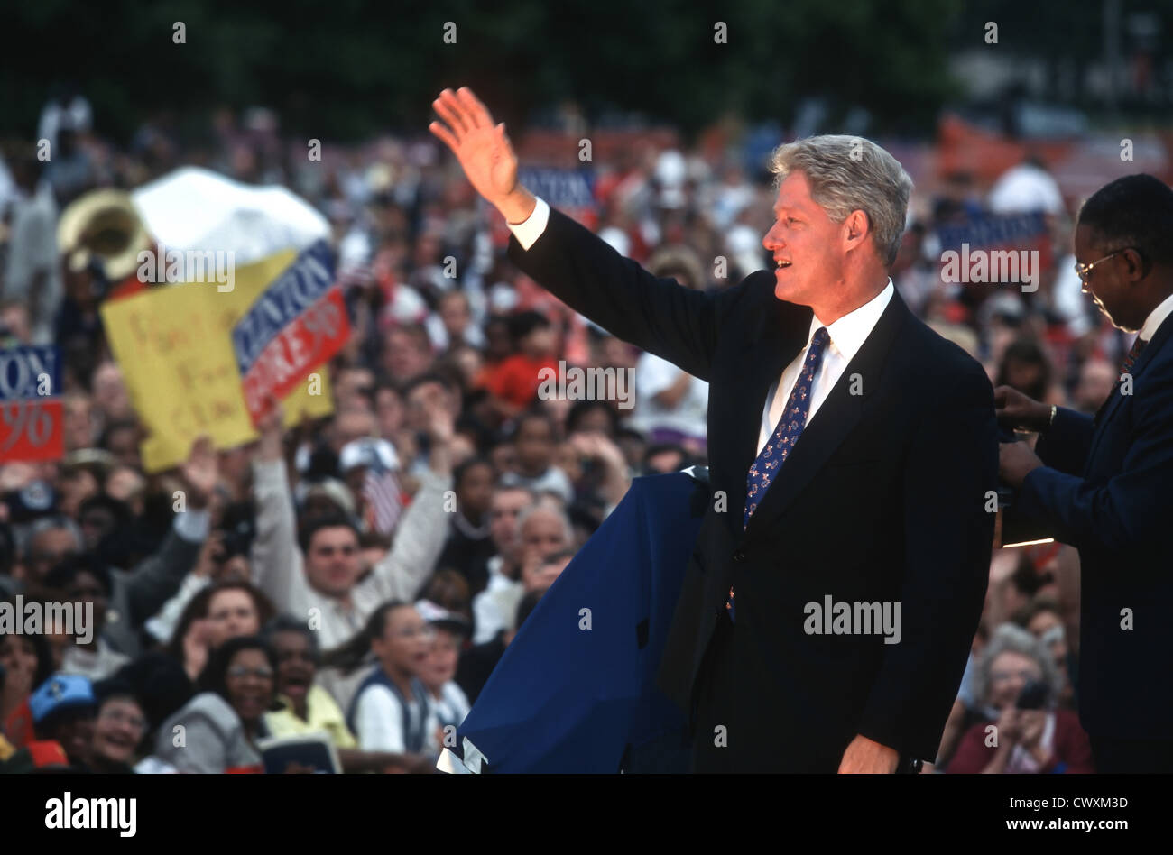 President Bill Clinton waves to supporters during a campaign stop for ...