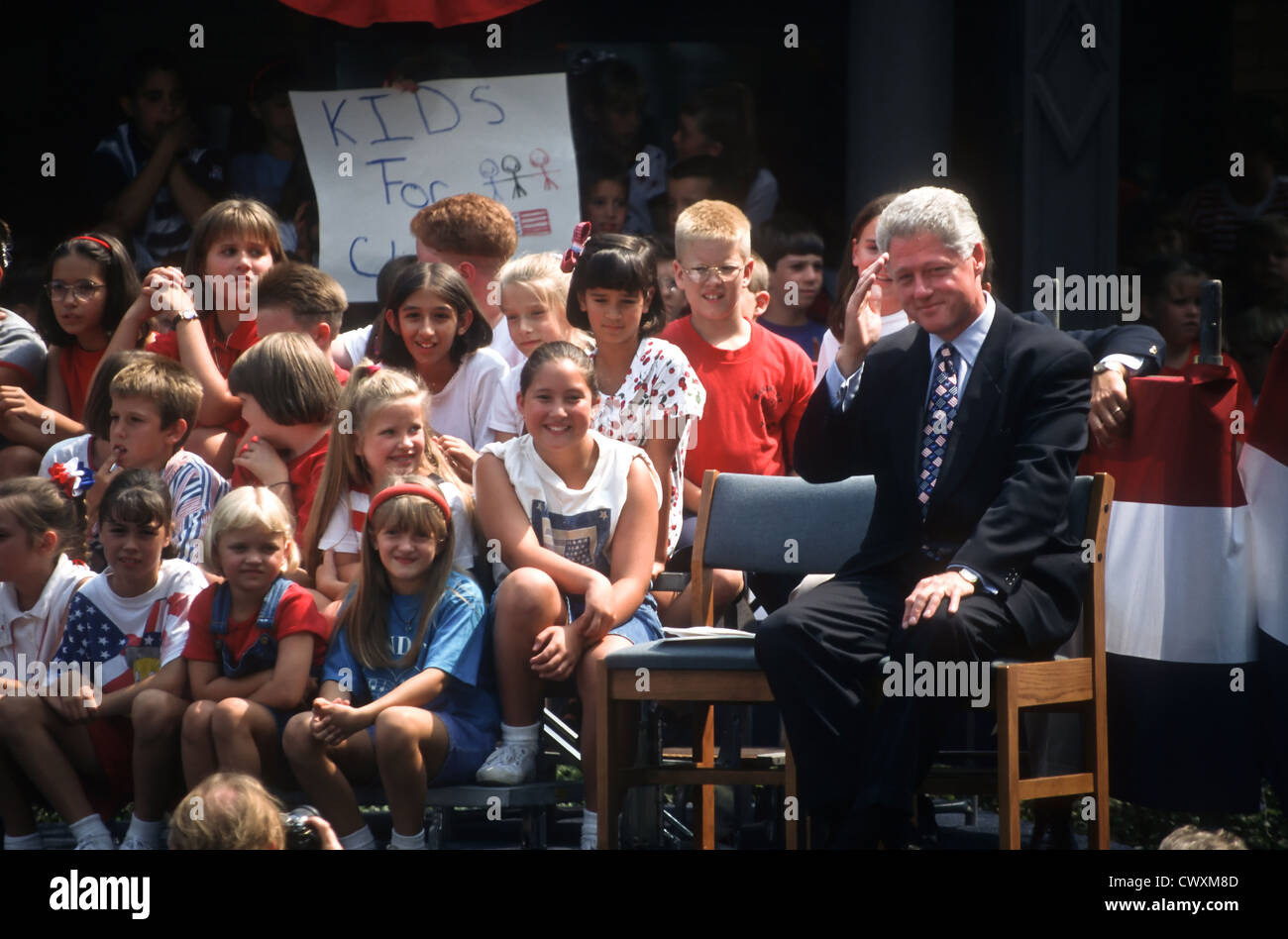 President Bill Clinton waves to supporters during a campaign stop for ...
