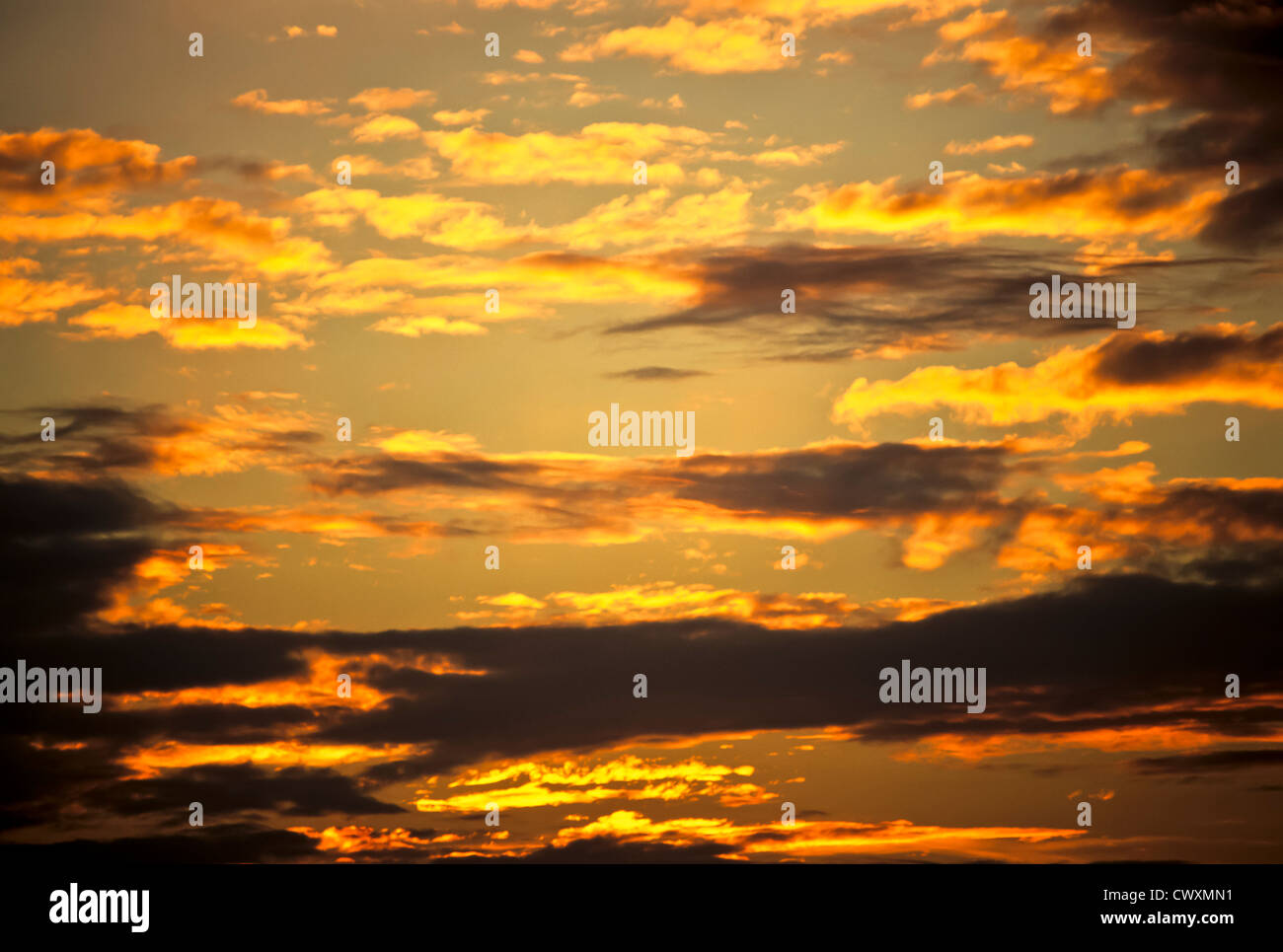 Sunset with clouds hi-res stock photography and images - Alamy