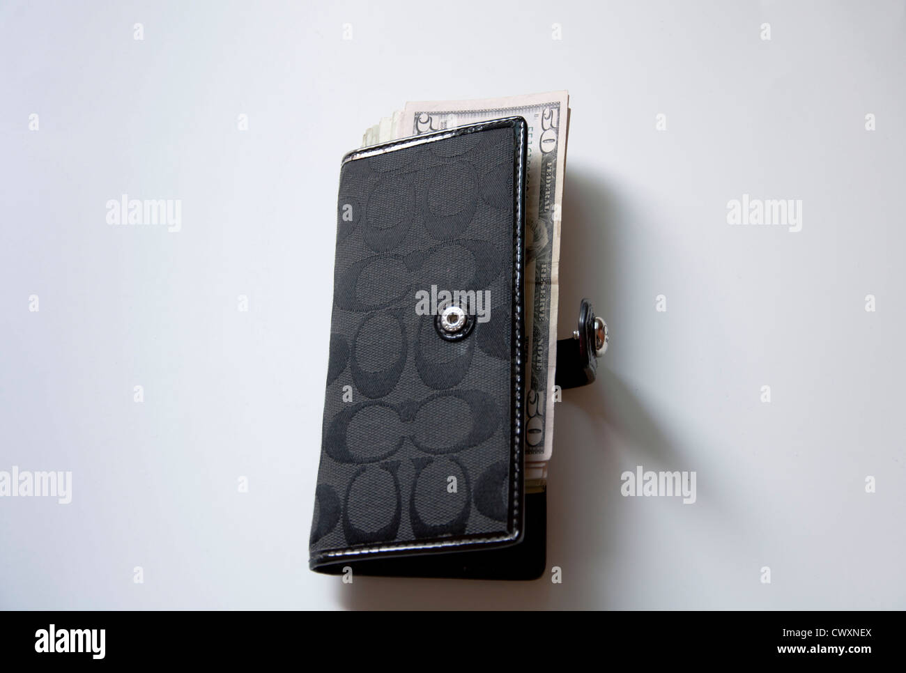 Money in wallet Stock Photo - Alamy