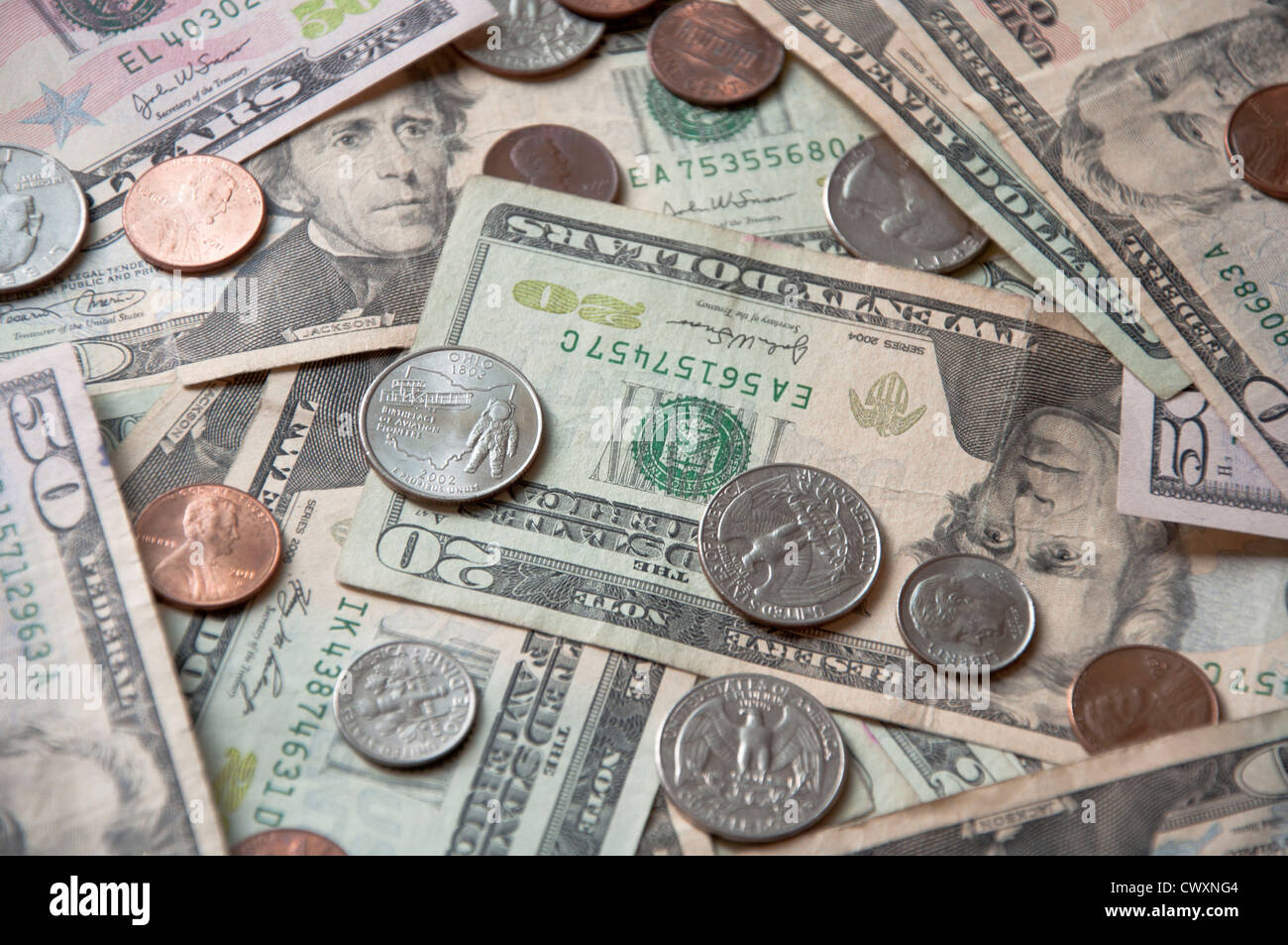 Pile of money Stock Photo - Alamy