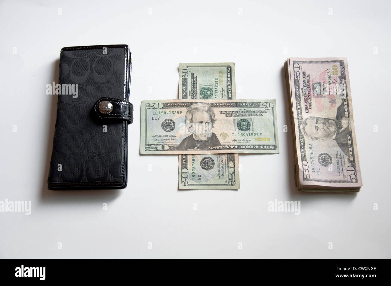 Money in wallet Stock Photo - Alamy