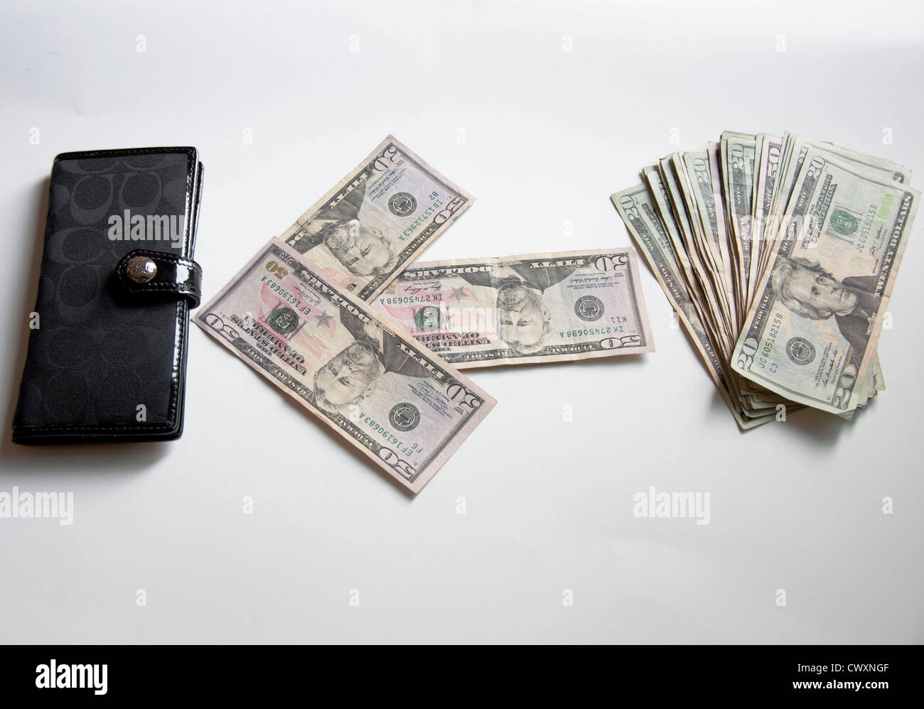 Money in wallet Stock Photo - Alamy