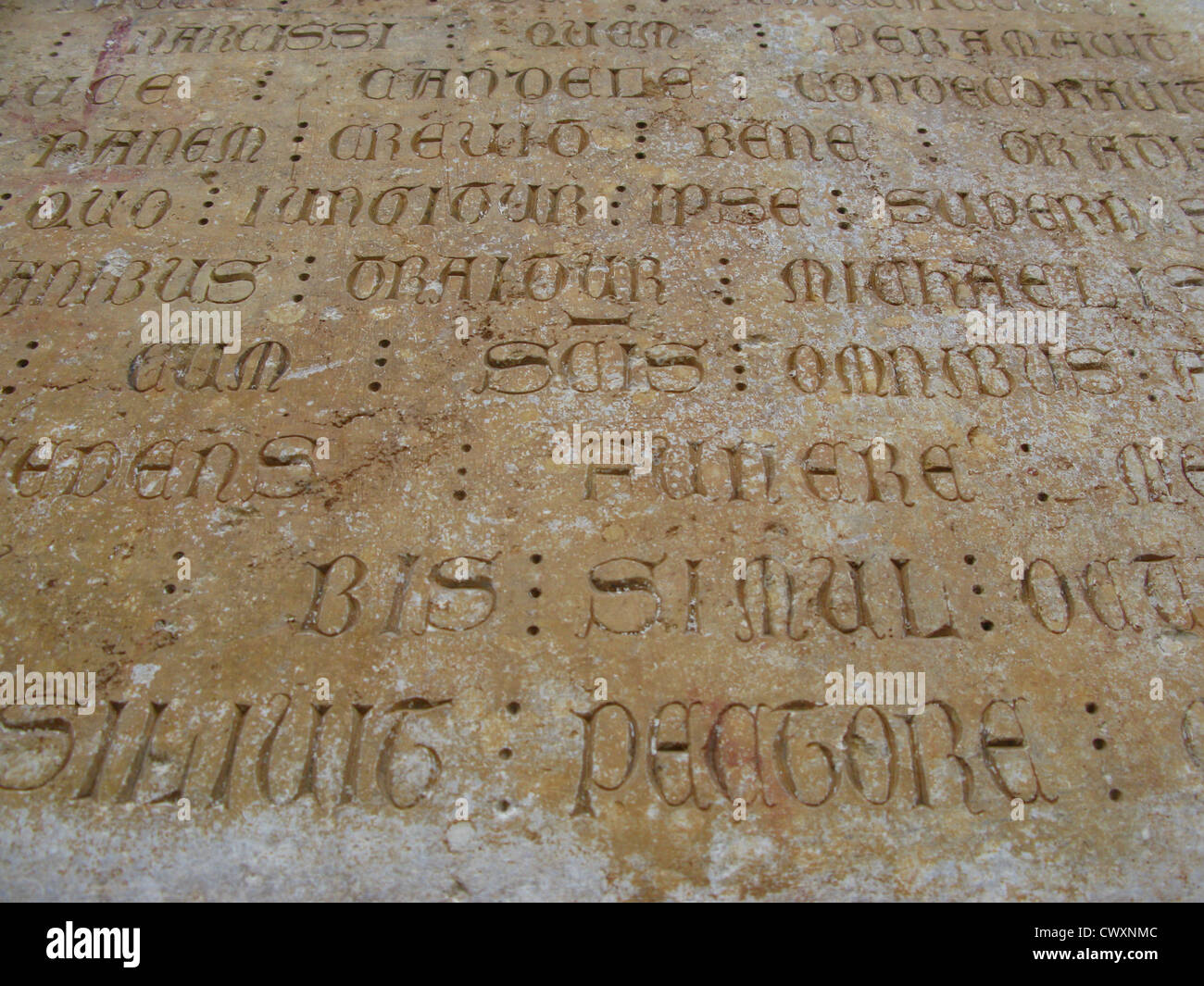 Ancient Script etched in Wall Stock Photo - Alamy