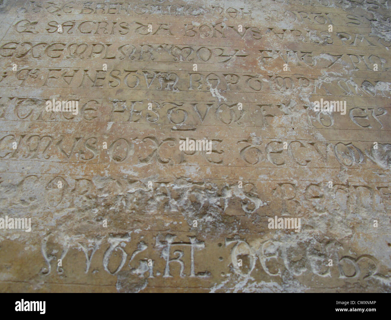 Ancient Script etched in Wall Stock Photo - Alamy