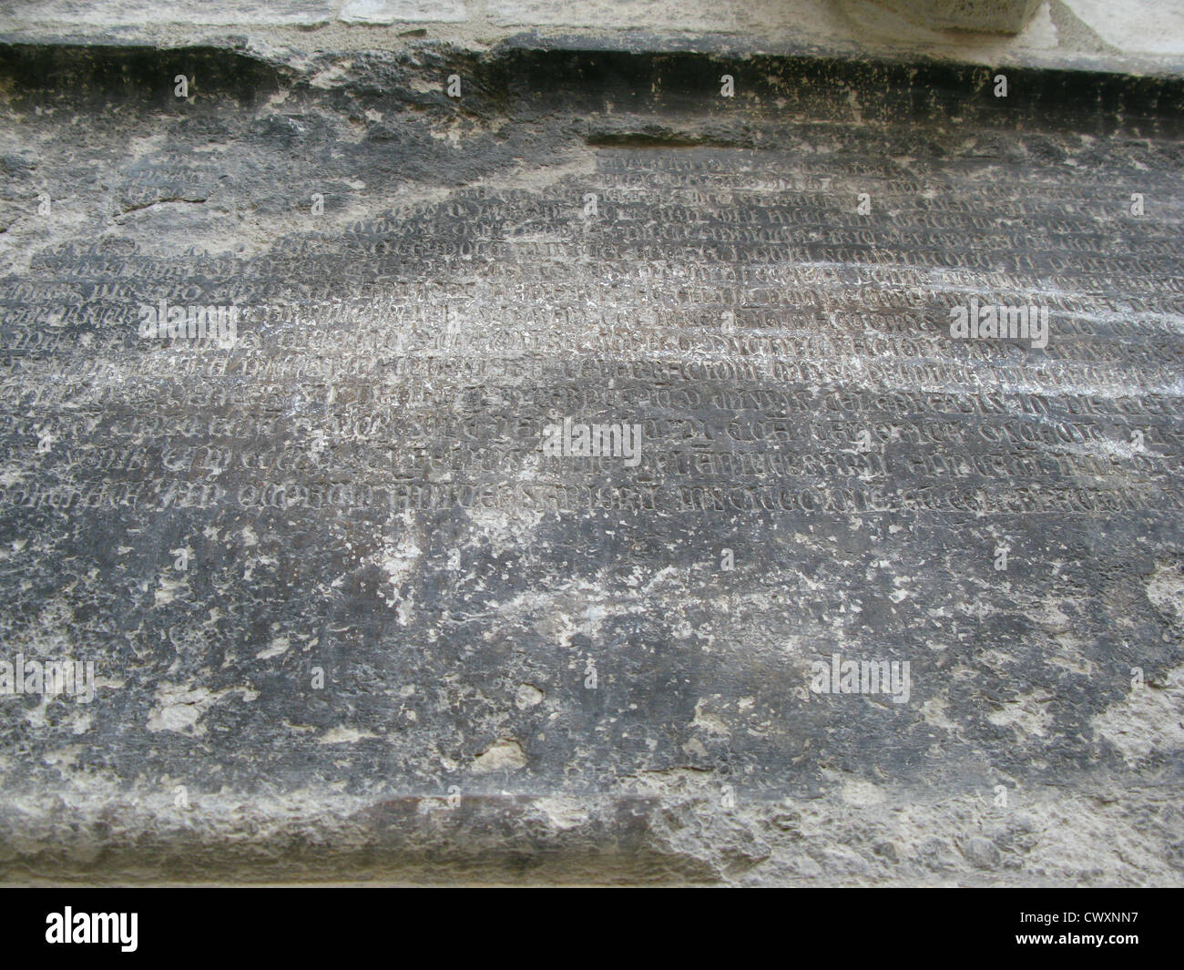 Ancient Script etched in Wall Stock Photo - Alamy