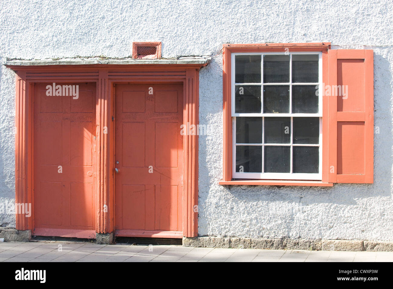 Terrace House with Terracotta colored Doors and Shutters Stock Photo ...
