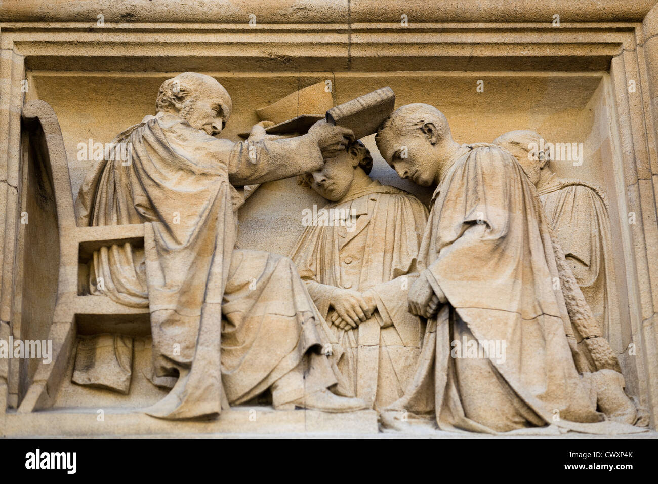Stone sculpture of scholar's Stock Photo - Alamy