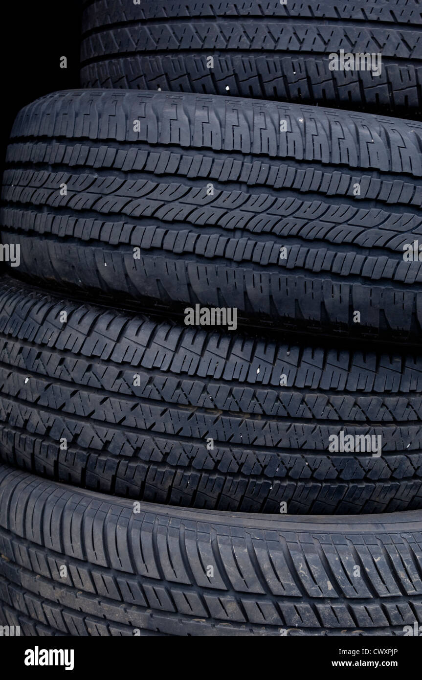 Used tires stacked up Stock Photo - Alamy
