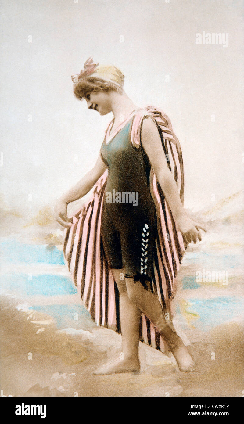 Smiling Woman Wearing One-Piece Bathing Suit with Striped Cape, hand ...