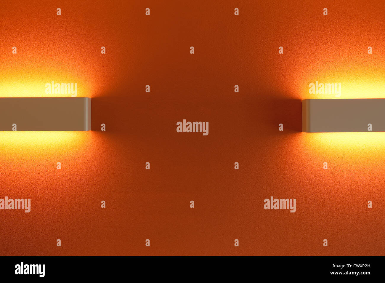 Motel Room with lights on wall Stock Photo - Alamy