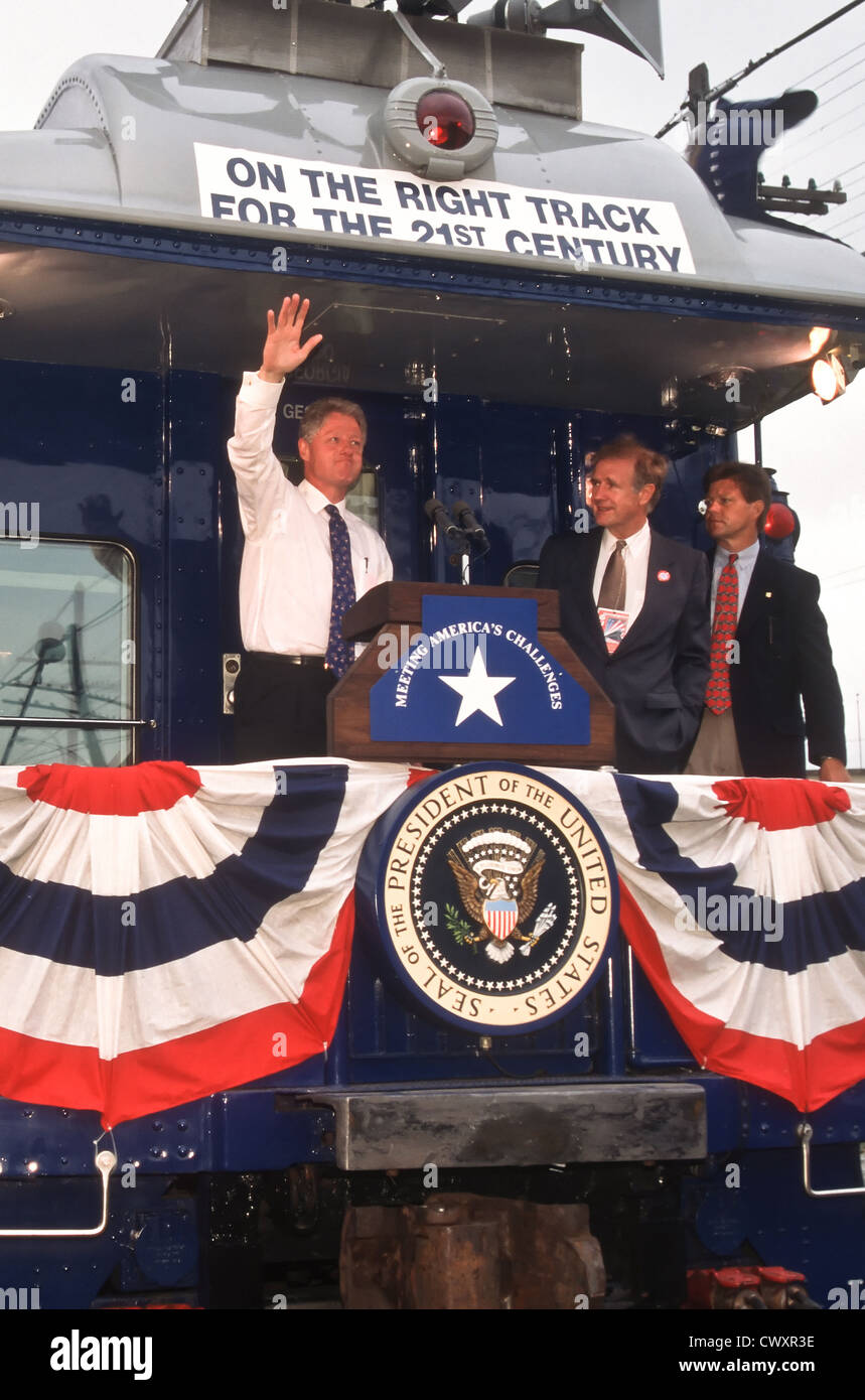 President Bill Clinton waves to his supporters during a campaign stop ...