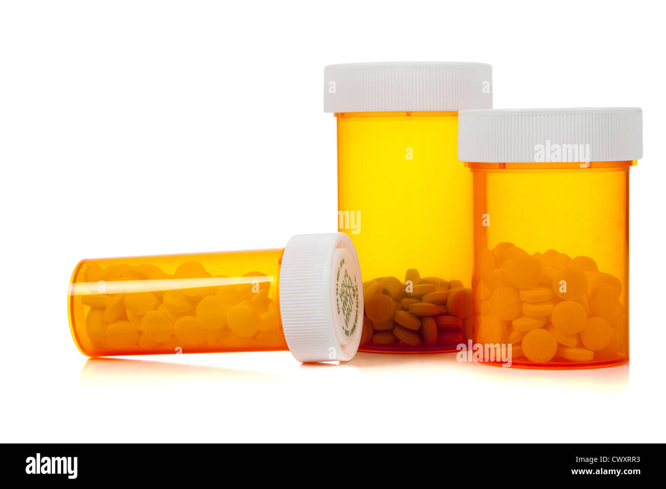 Orange pill bottles on a white background Stock Photo - Alamy