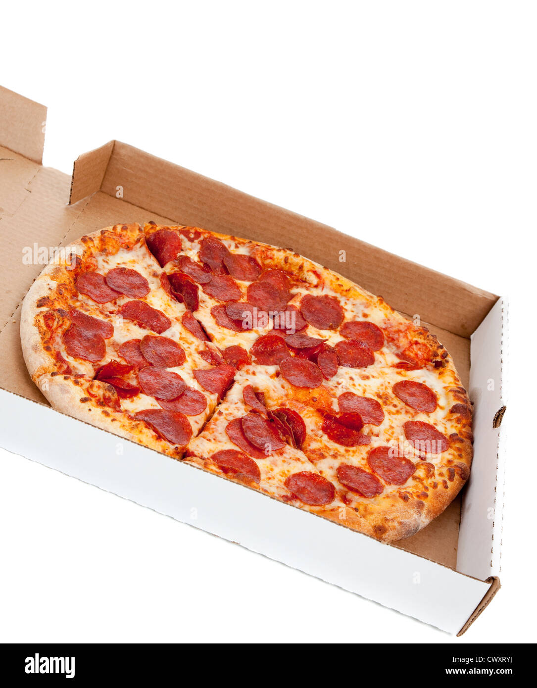 A whole pepperoni pizza in a white to go box on a white background ...