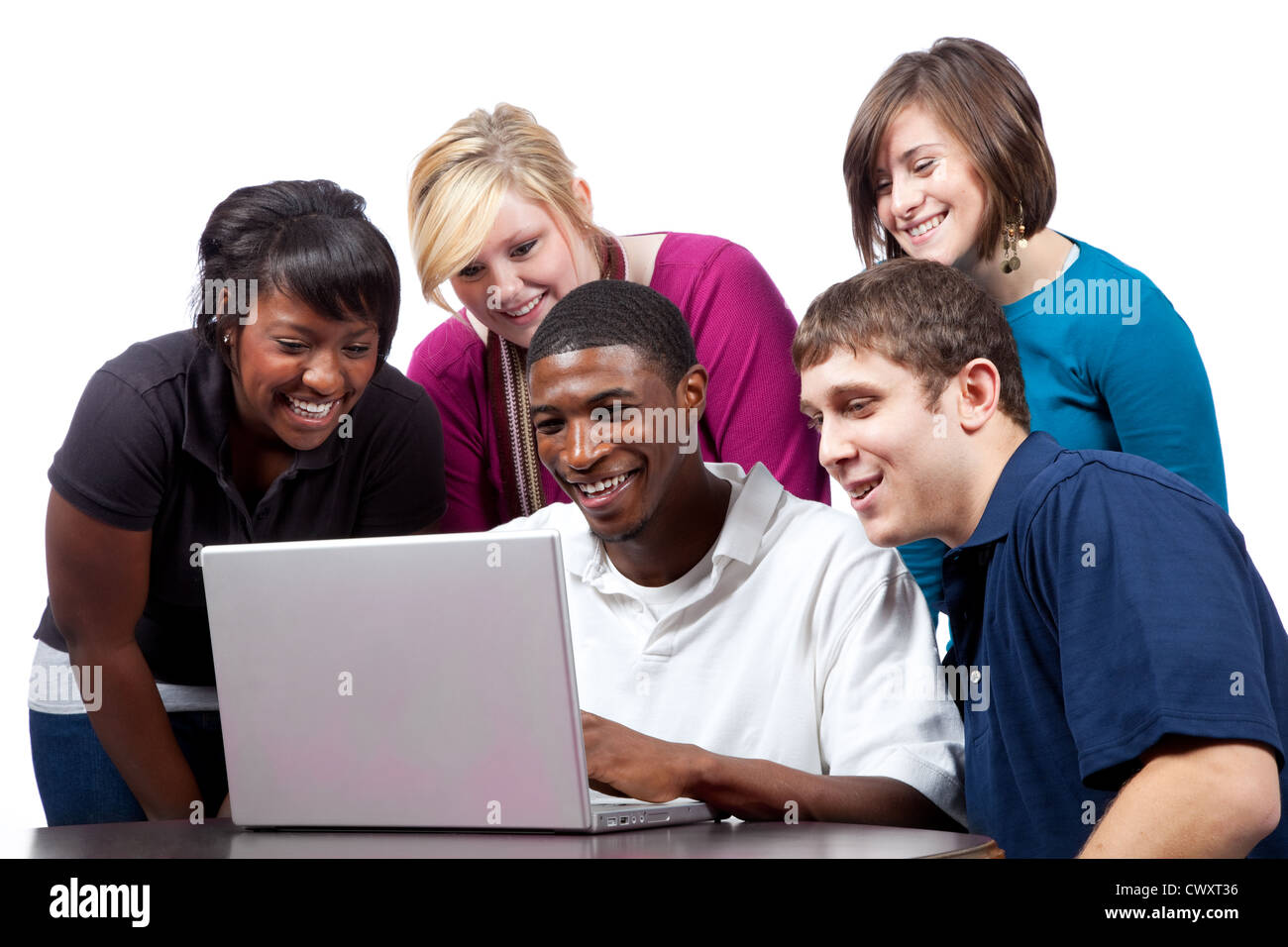 A group of multi-ethnic college students/friend looking at a computer ...