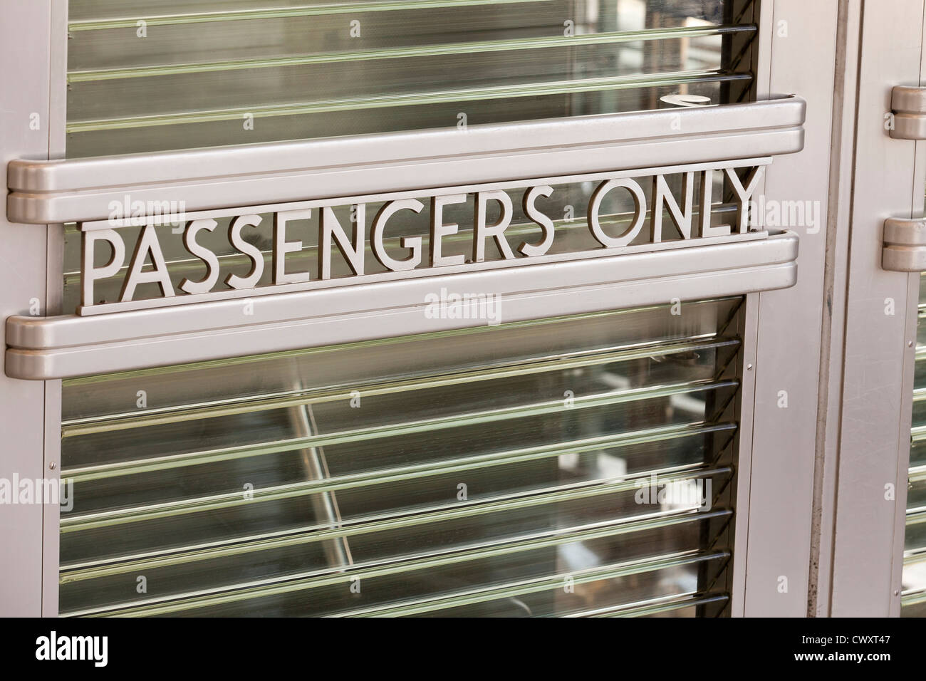 Passengers only sign Stock Photo - Alamy