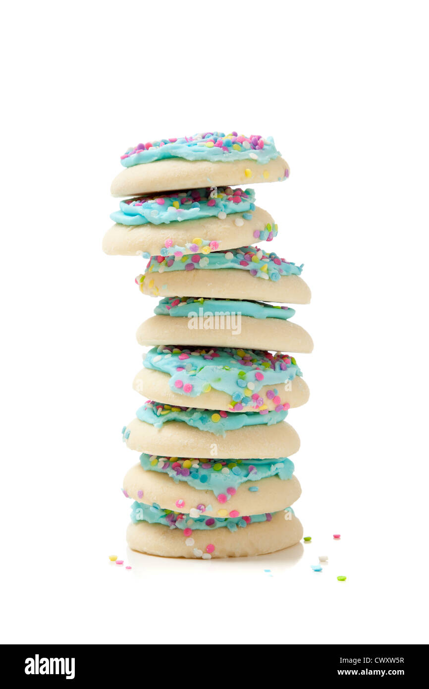 A stack of blue iced cookies on a white background Stock Photo - Alamy