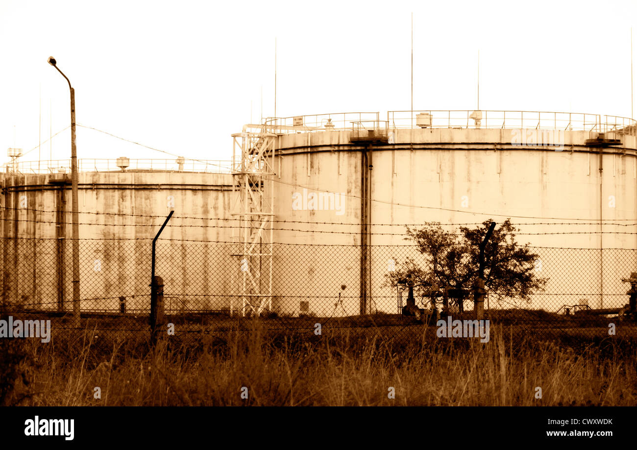 Huge old rusty fuel tanks Stock Photo - Alamy