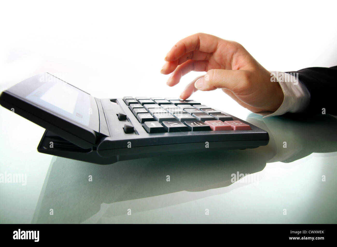 girl hand calculate on white background Stock Photo - Alamy