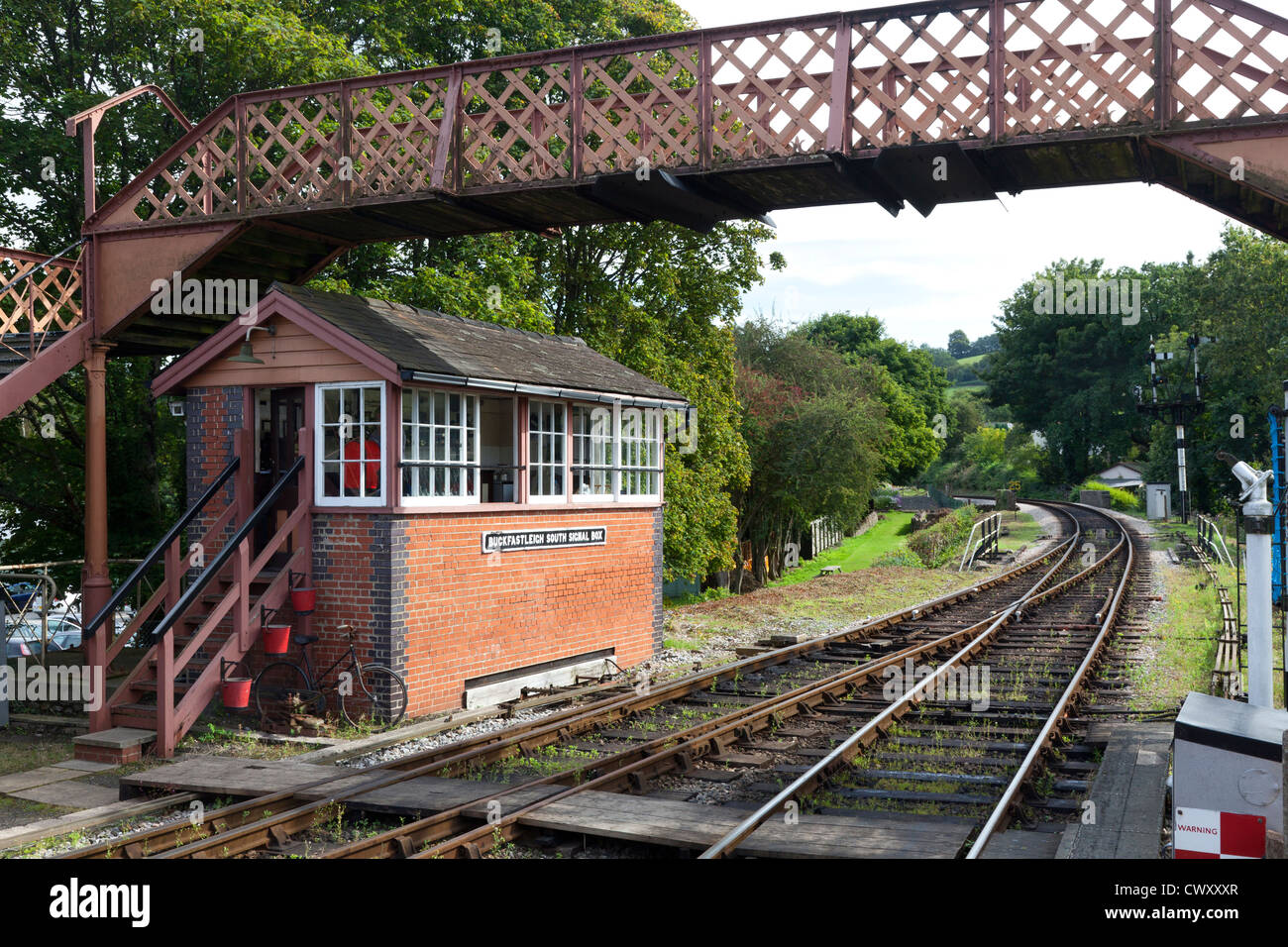 Signal box and footbridge at Buckfastleigh station on the South Devon ...