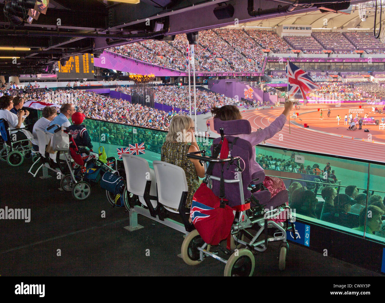 Spectators in wheelchairs watch Paralympic Games at the London 2012 ...