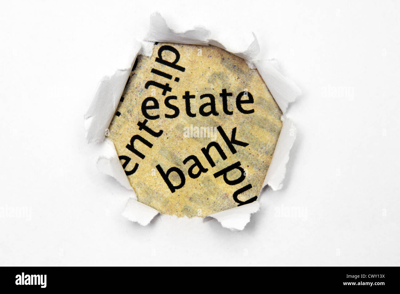 Estate text on paper hole Stock Photo - Alamy