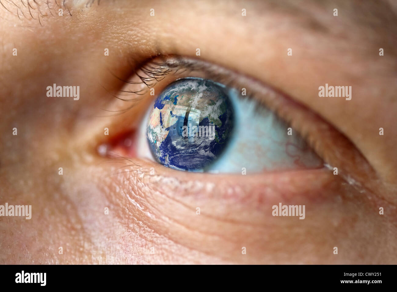 Close-Up of a male face with the earth in the eye Stock Photo - Alamy