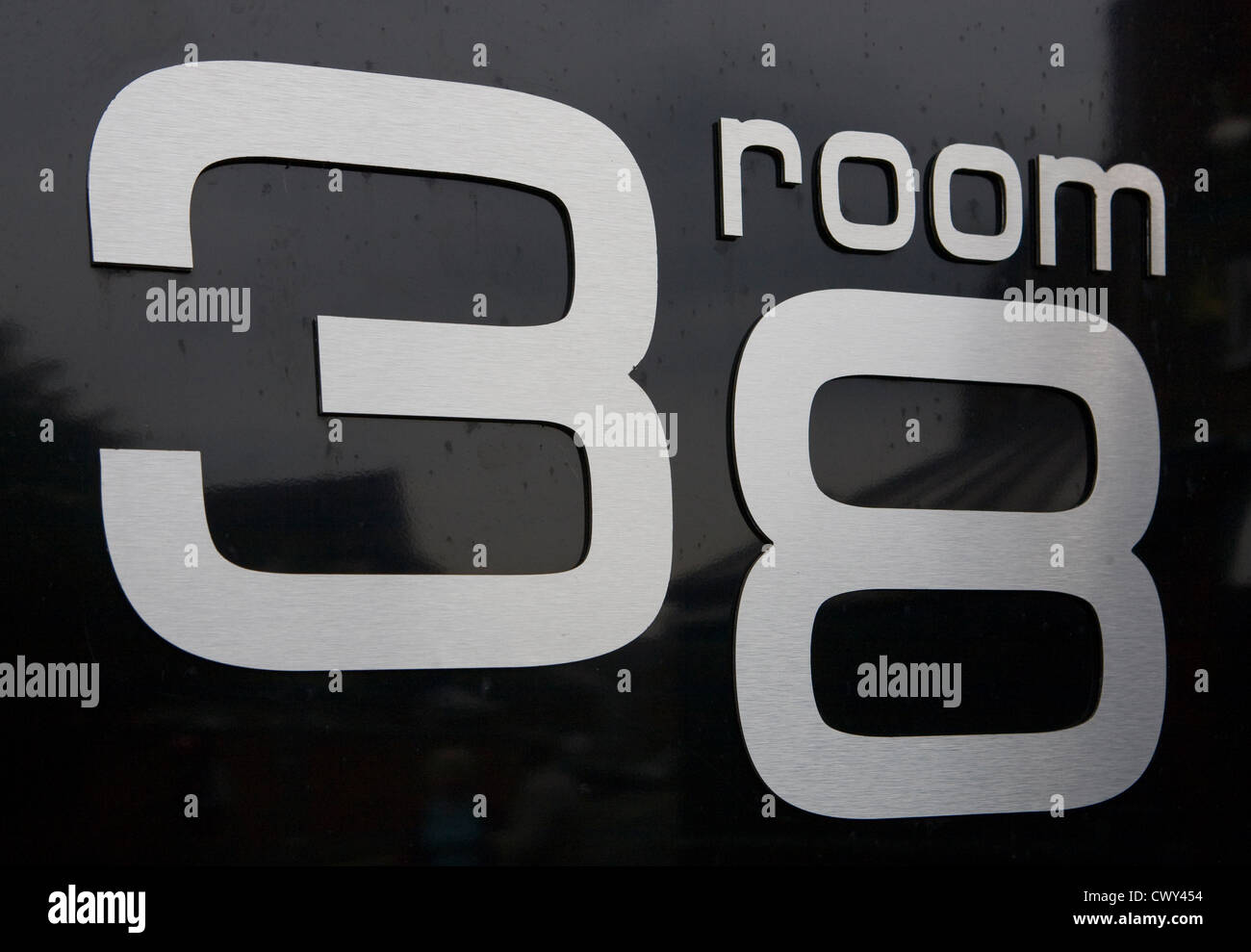 Number 38 thirty eight silver lettering on black background Stock Photo ...