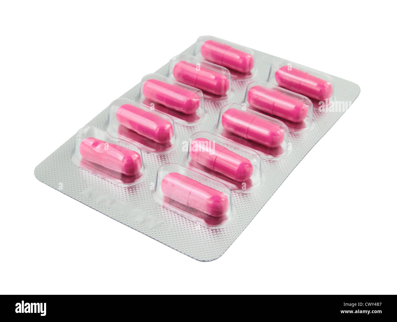 Pink pills pack on white background Stock Photo - Alamy