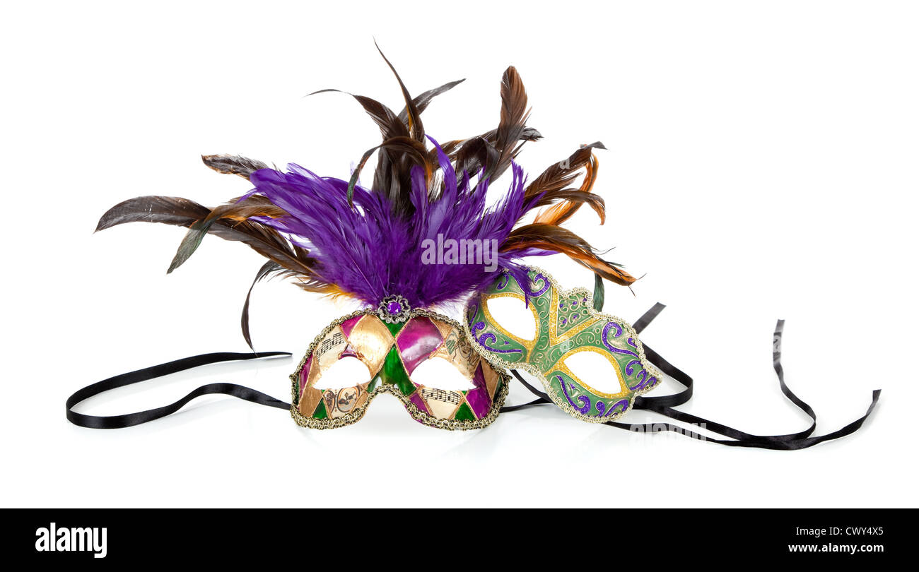 Purple, green and gold Mardi Gras masks on a white background with copy ...