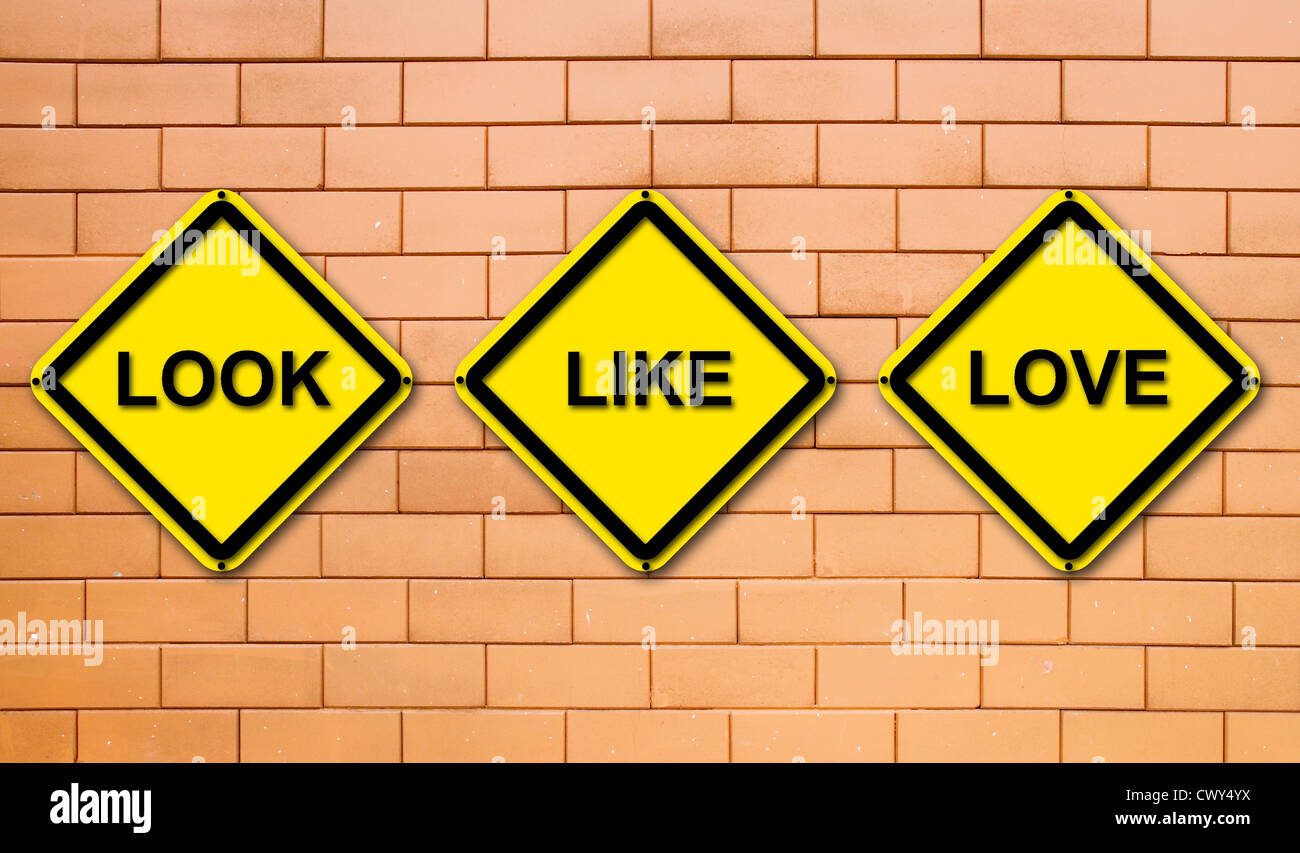 look, like, love sign on brick wall background Stock Photo - Alamy