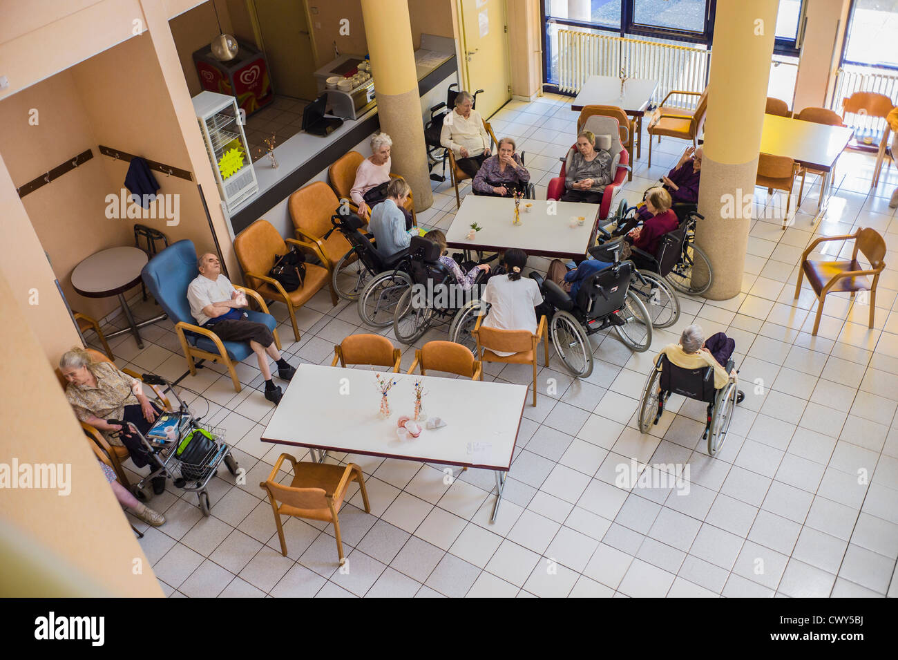 Wheelchaired senior residents in retirement home, EHPAD French nursing ...