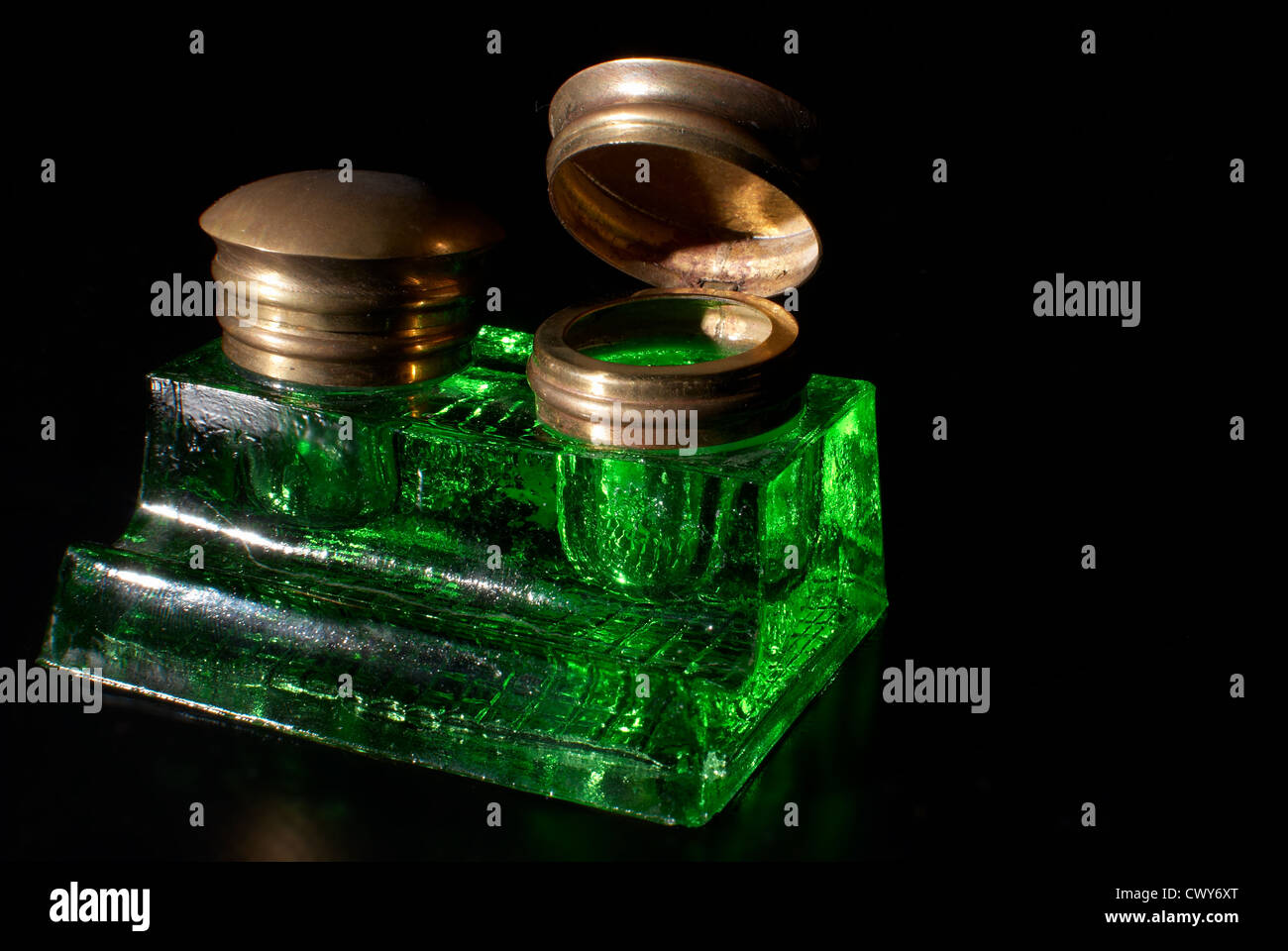 Vintage crystal ink well with copper lid Stock Photo - Alamy