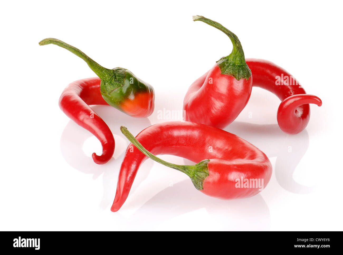 curved red chilli peppers isolated on white Stock Photo - Alamy