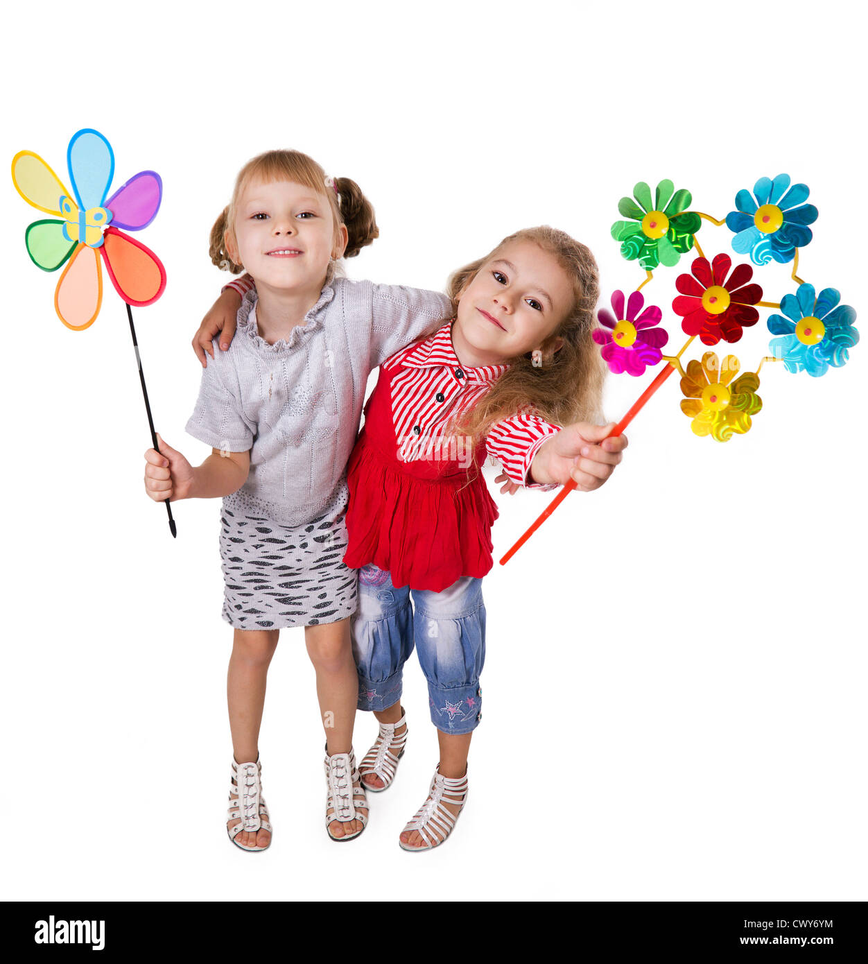 Two fun girls of the girlfriend play. White isolated Stock Photo - Alamy