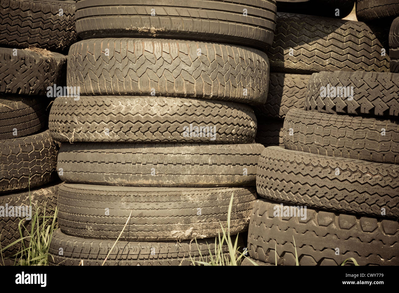 Pile of tires at the dump. Horizontal shot Stock Photo - Alamy