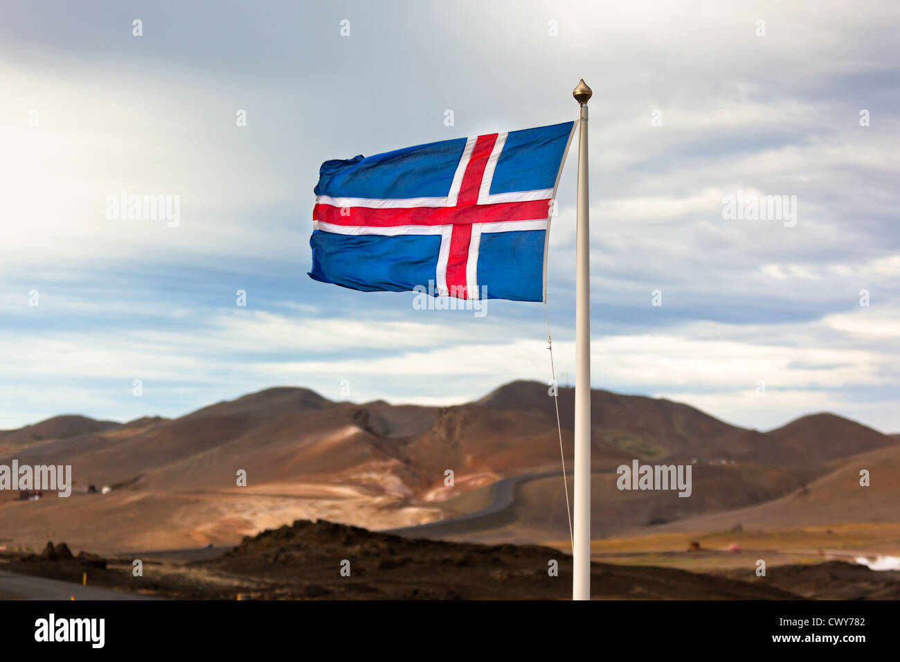 The flag of Iceland waving in the wind on a background of a stormy sky ...