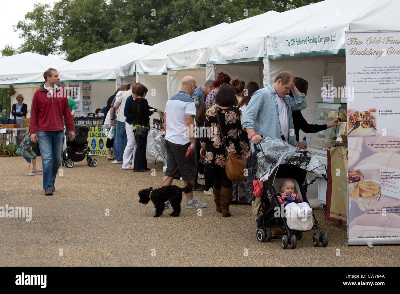 Shopper at a food fair Stock Photo - Alamy