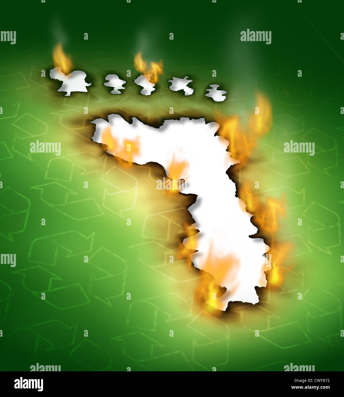 Conservation concept as a footprint hole with smoke damaged burnt green ...