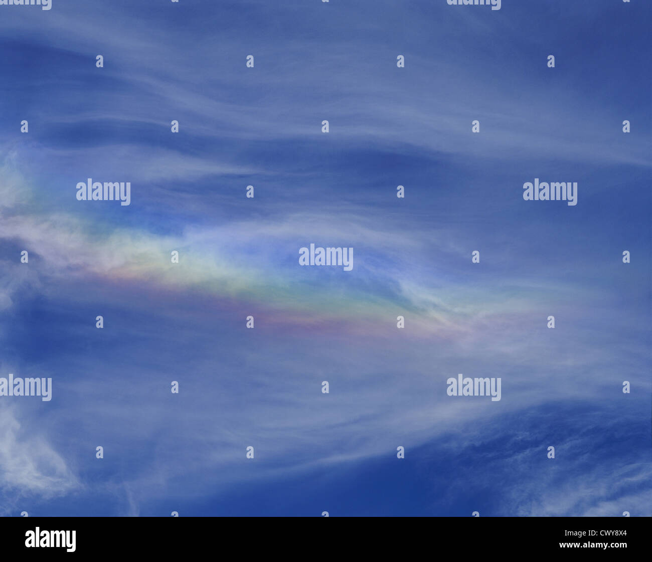 Rainbow of ice crystals in cloud formation Stock Photo - Alamy