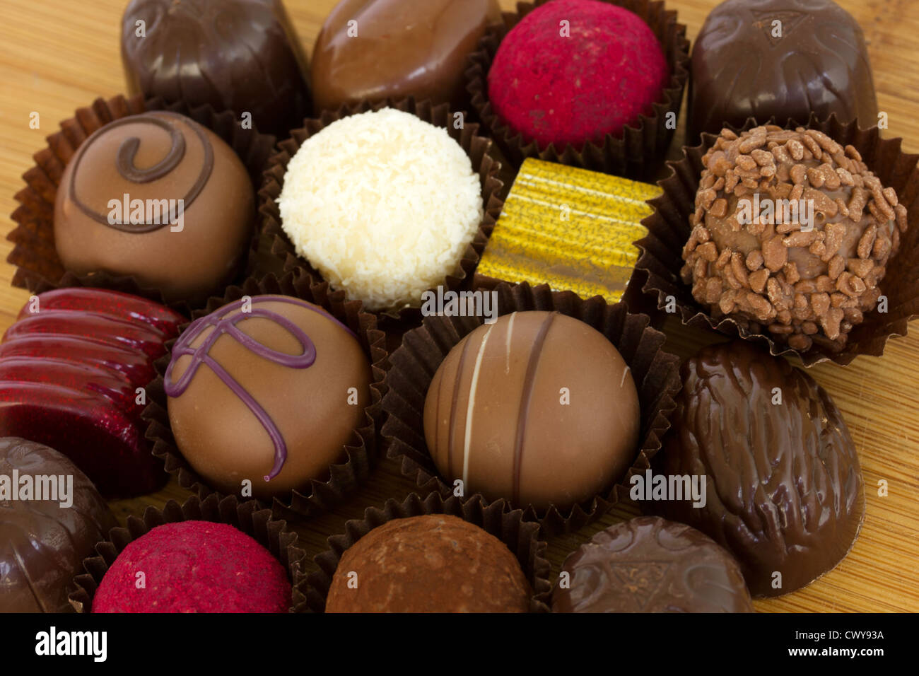 selection of chocolated sweet pralines close up Stock Photo - Alamy