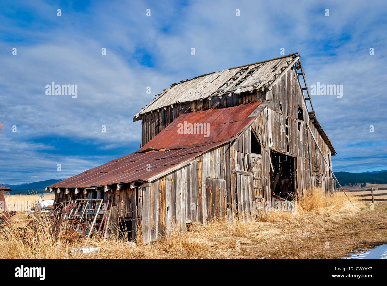 Rusty and weathered old barn in the warm light of evening Stock Photo ...