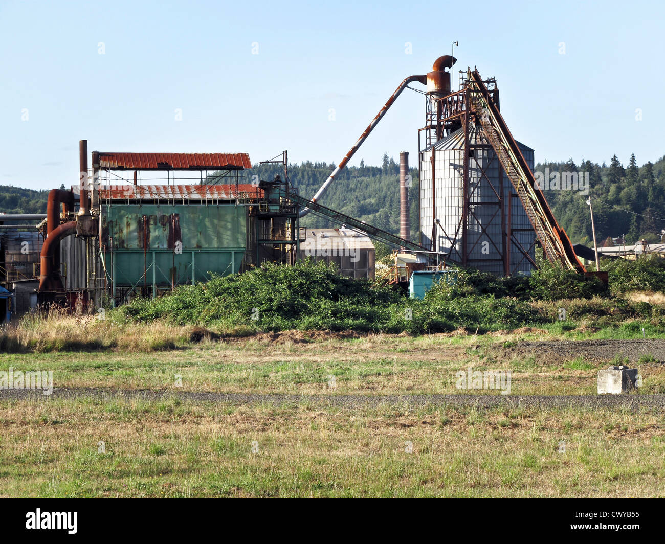 picturesque rusting buildings & other components piping of abandoned ...