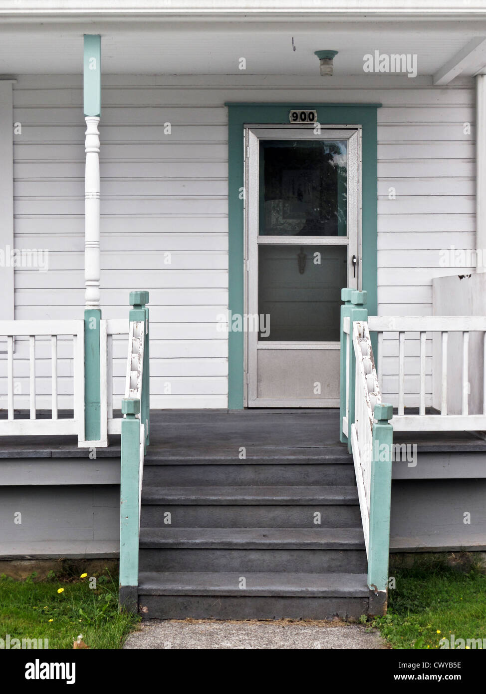 stairs & porch of simple white clapboard Victorian house with original ...
