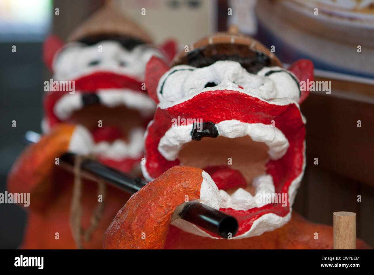 Two Shiisa lion god statues in the Ryukyu Mura theme park in Okinawa ...