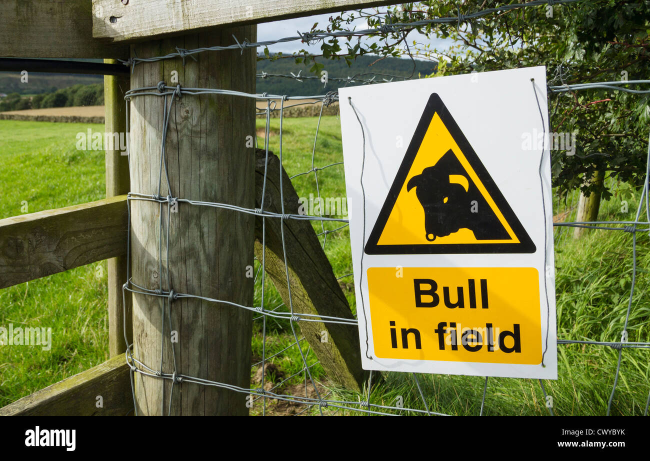 Bull in field sign near stile on public footpath Stock Photo - Alamy