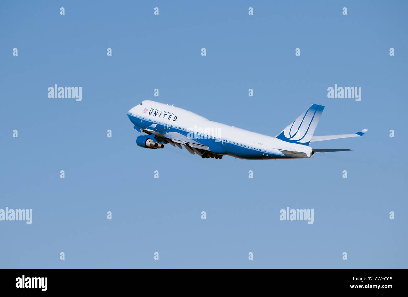 United Air Lines Boeing 747 Jumbo Jet taking off over the Pacific Ocean ...